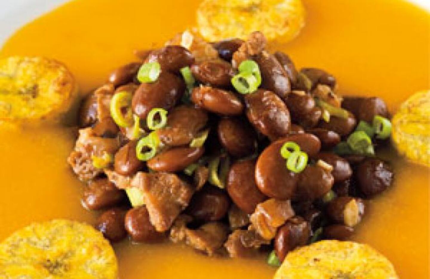 Frijoles cubaces con patita de cerdo en salsa de ayote | La Nación